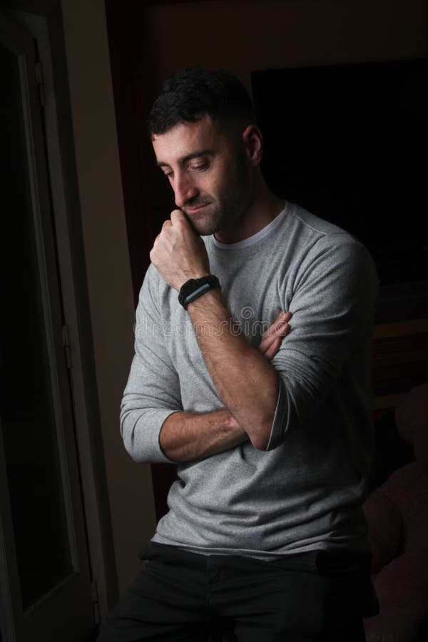Hispanic Young Man Deep in Thoughts Stock Photo - Image of home ...