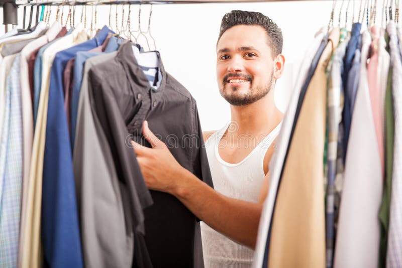 Hispanic Young Man Getting Dressed Stock Photos - Free & Royalty-Free ...
