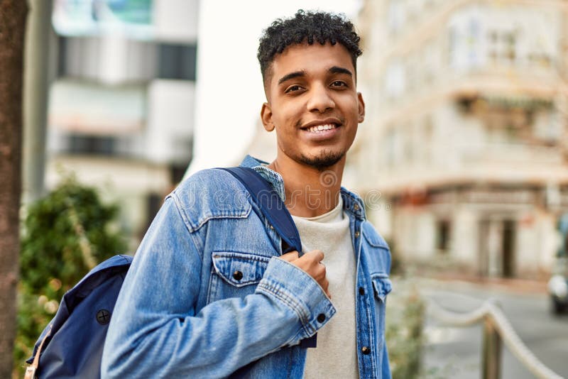 Hispanic Young Man Smiling at the Street Stock Photo - Image of ...