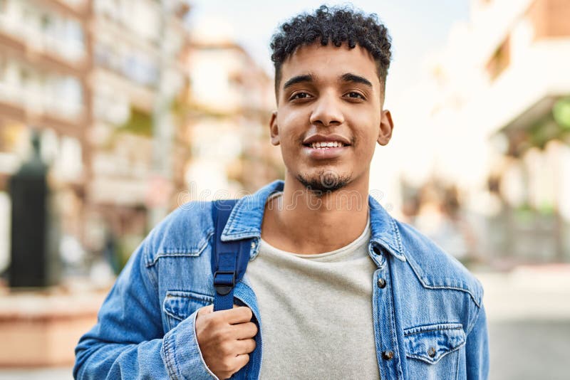 Hispanic Young Man Smiling at the Street Stock Image - Image of ...