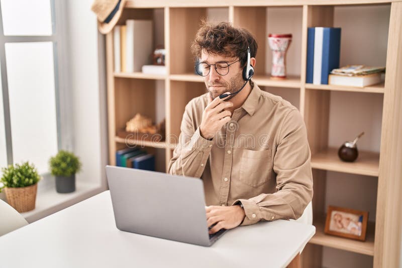 Hispanic Young Man Wearing Call Center Agent Headset Serious Face ...