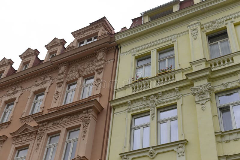 Historic Building Facades Painted in Soft Colors Featuring Charming ...