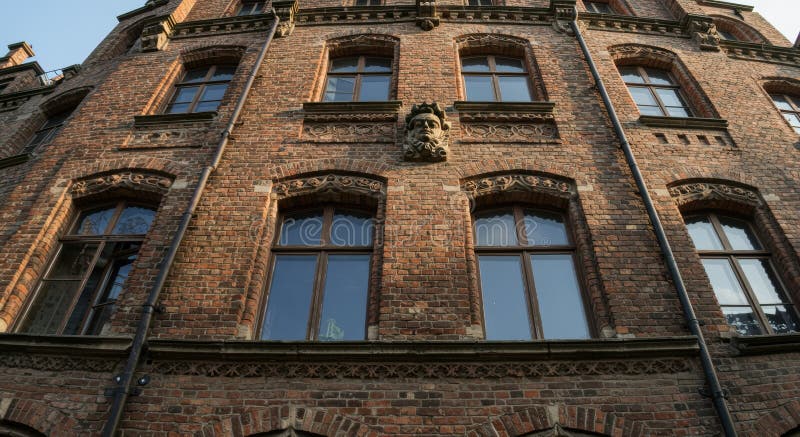 Historic Brick Building with Ornate Windows and Architectural Details ...