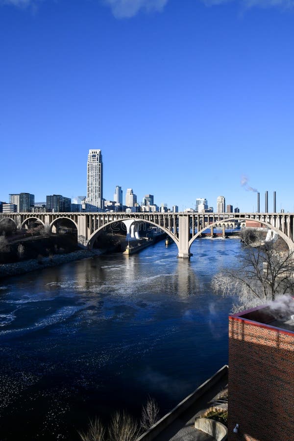 Historic Bridge Across the Mississippi River in Winter in Minneapolis ... Historic Bridge Across the Mississippi River in Winter in Minneapolis ...