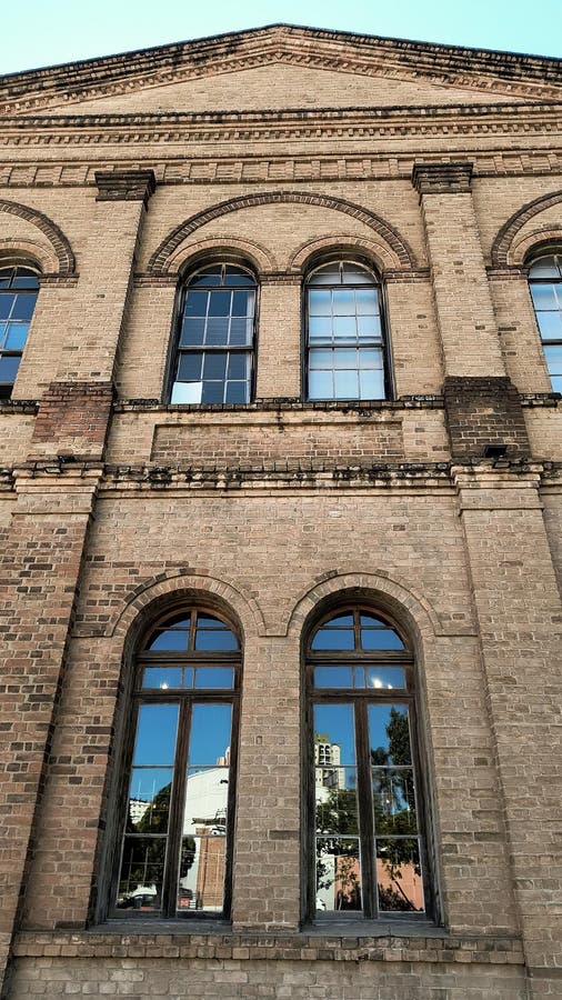 A Historic Building Made of Clay Bricks and Large Windows Editorial ...