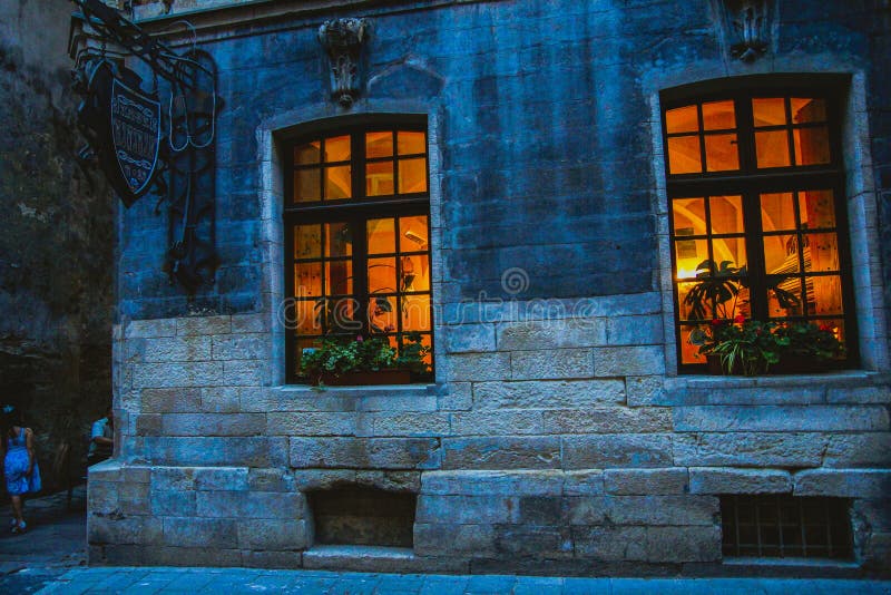 Old Building with Windows in Which the Light in the Window is on ...