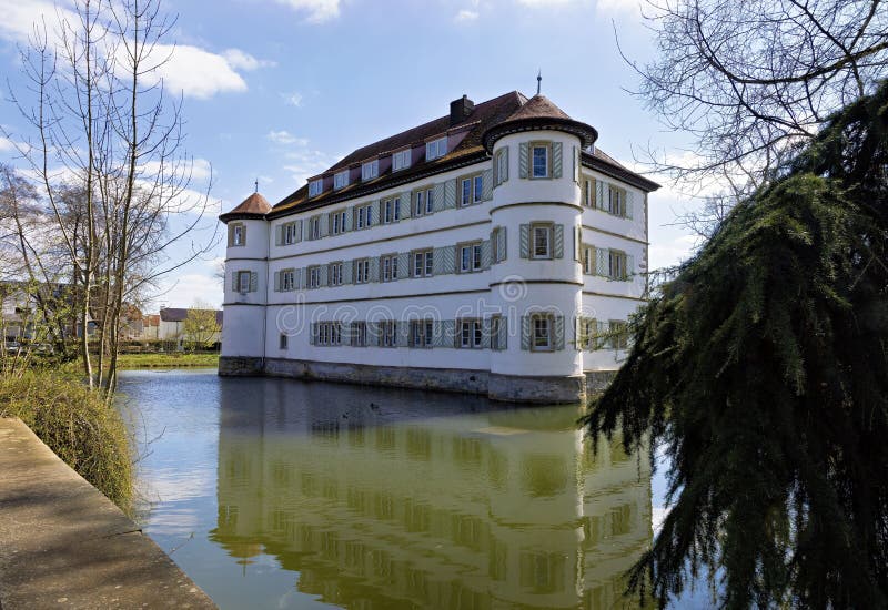 Historic Castle with Moat Under Blue Sky. Stock Photo - Image of ...