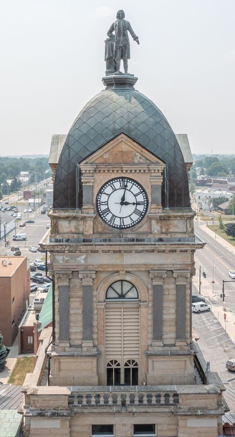 Historic Clock Tower with Statue in Small Town Stock Photo - Image of ...