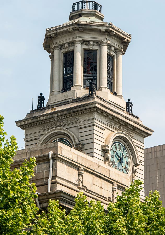 Historic Clock Tower Under a Clear Blue Sky. Wuhan, China Stock Image ...