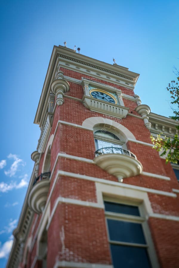 Historic Clocktower Building Against a Blue Sky Stock Image - Image of ...