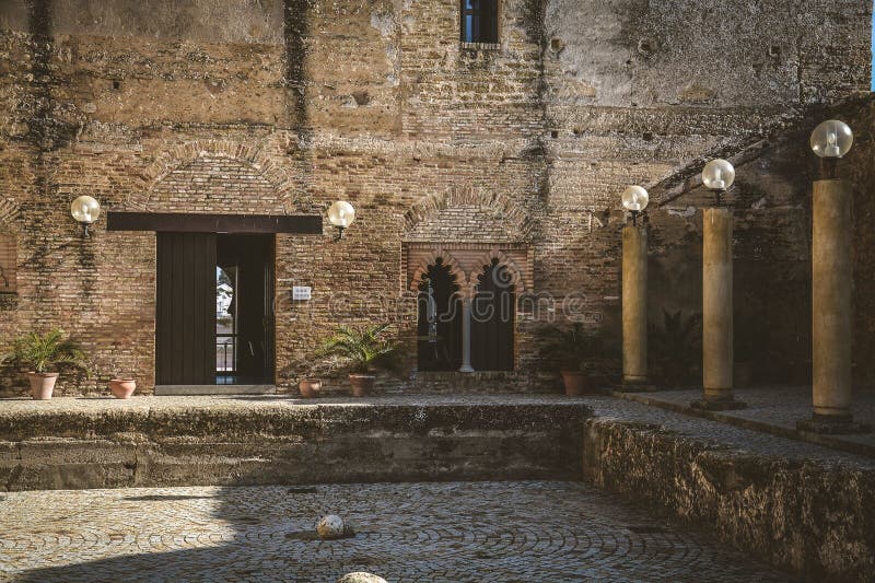 Historic Courtyard with Arched Windows and Columns. Stock Image - Image ...