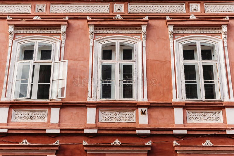 Historic European Building Facade Featuring Elegant Windows and ...