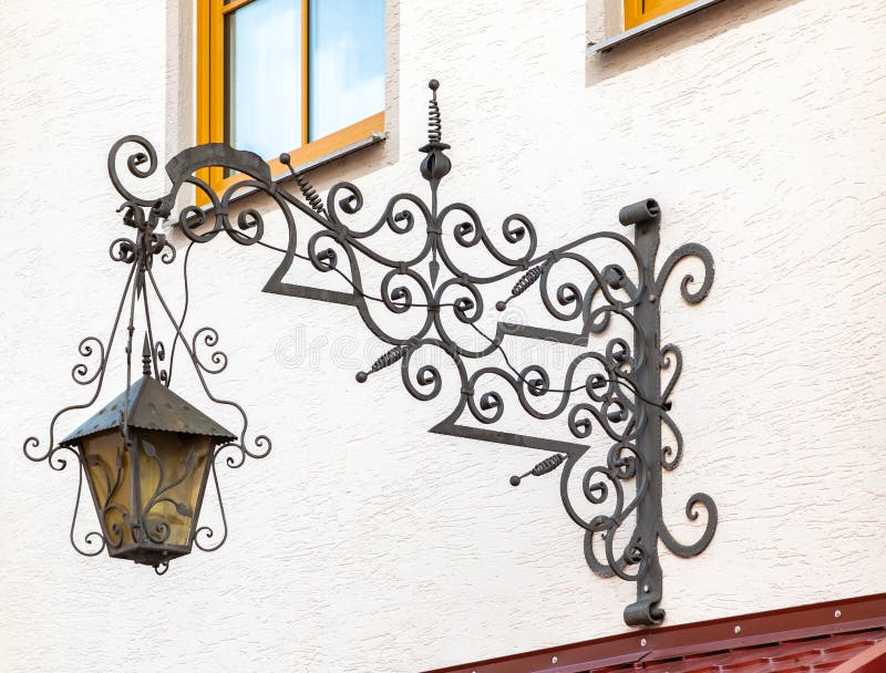 Historic lantern on a wall stock photo. Image of lamp - 212478798