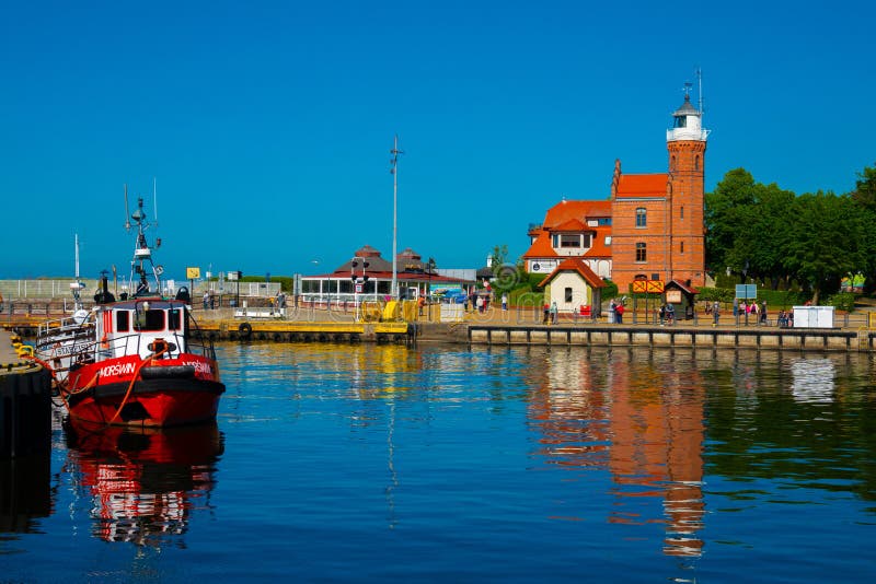 Historic Lighthouse Building at Shoreline Slupia River in Ustka, Poland ... Historic Lighthouse Building at Shoreline Slupia River in Ustka, Poland ...