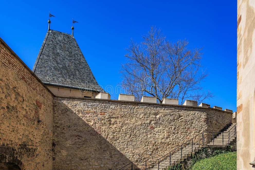 Historic Medieval Stone Wall and Tower with Blue Sky Backdrop Stock ...