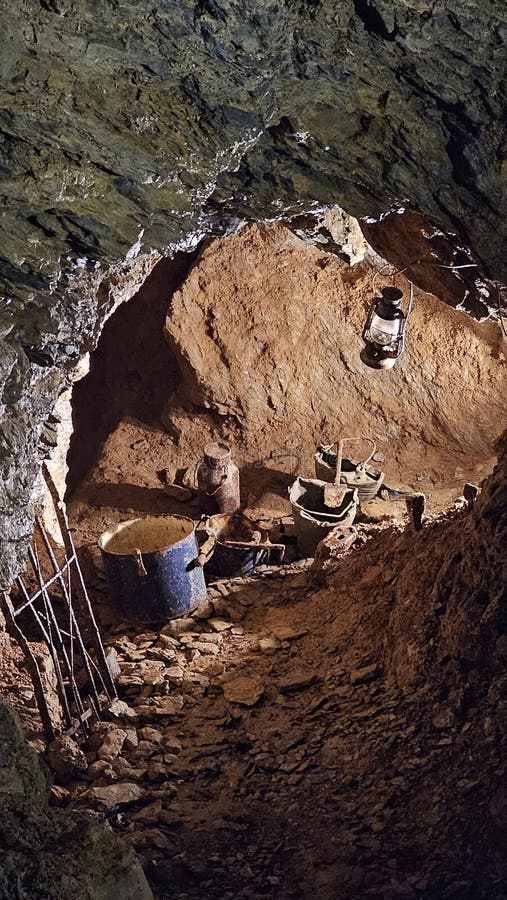 Historic Mining Tools in Rustic Cave Stock Photo - Image of historic ...
