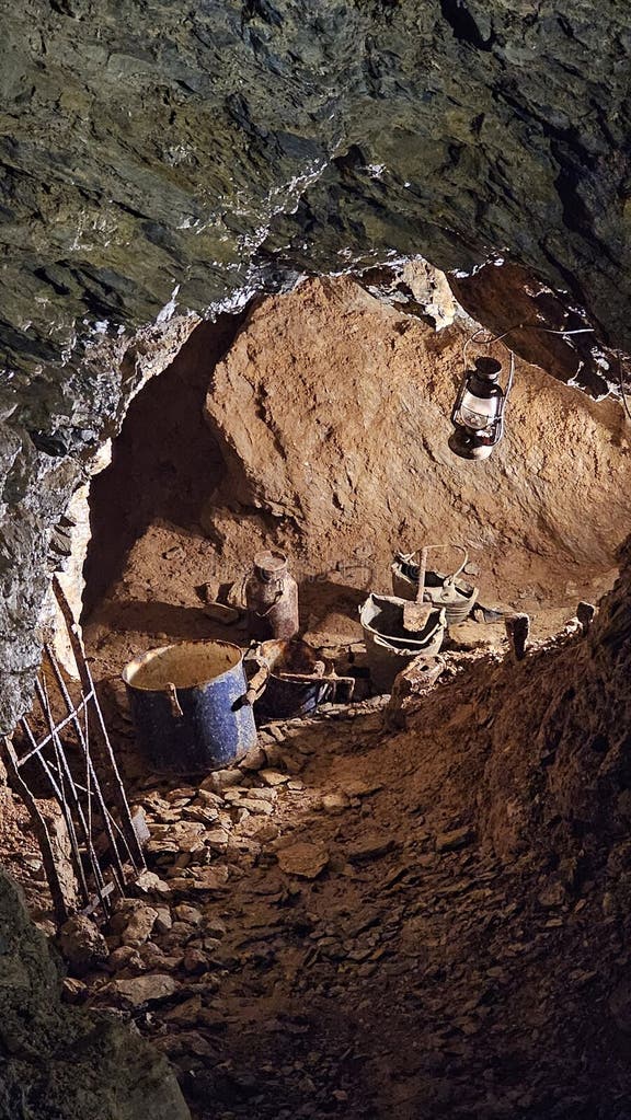 Historic Mining Tools in Rustic Cave Stock Photo - Image of historic ...