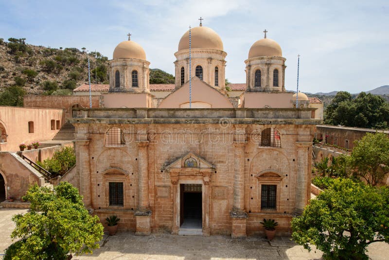 A Historic Monastery with an Elegant Stone Facade and Three Domes ...