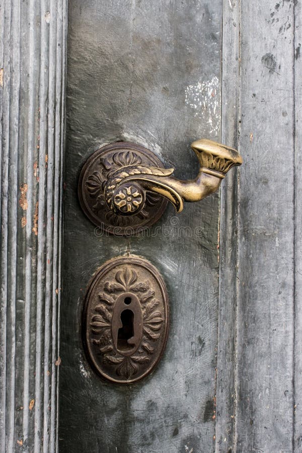 The Historic Old Handle on the Wooden Doors Stock Image - Image of ...