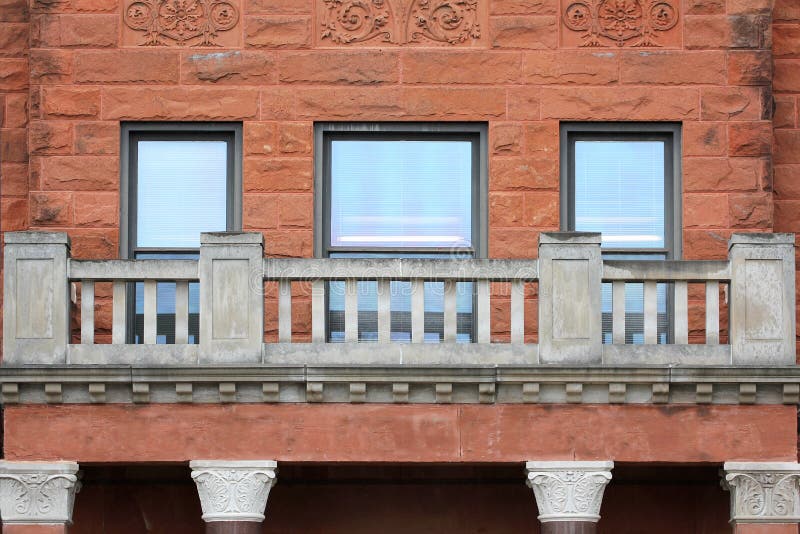 Historic Old Red Sandstone Building Windows Brick and Balcony Stock ...