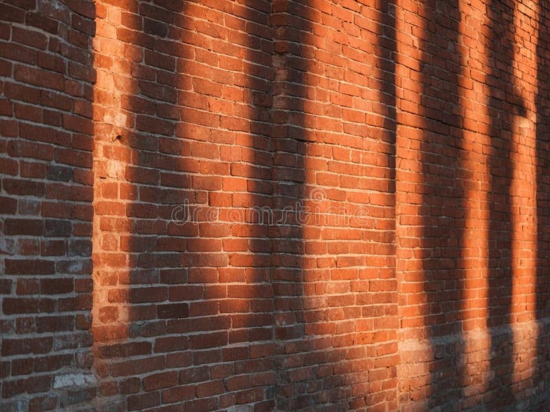 Historic Red Brick Wall Bathed in Warm Light. Stock Photo - Image of ...