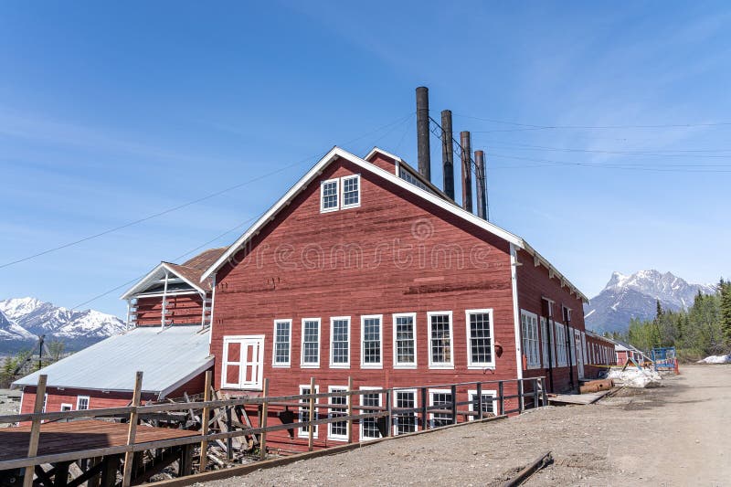 Historic Red Building with Mountains Editorial Photo - Image of mill ...