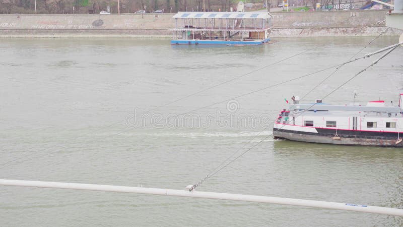 Historic Riverboat Glides Tranquilly Across Serene Waters Past ... Historic Riverboat Glides Tranquilly Across Serene Waters Past ...