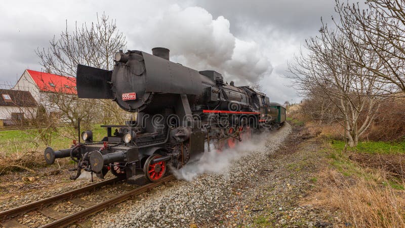 Historic Steam Train Pulling Several Carriages Stock Photo - Image of ...