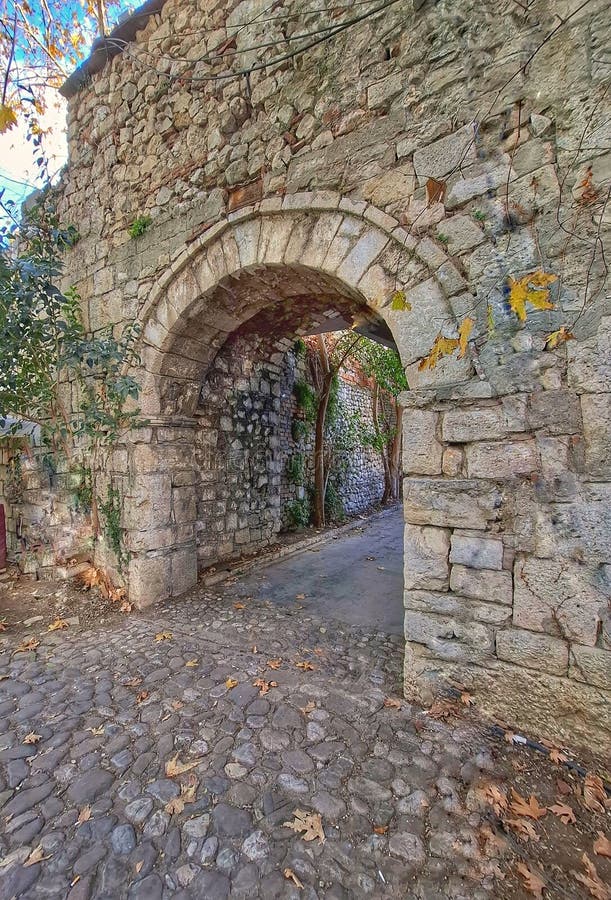 Historic Stone Archway with Cobblestone Path Stock Photo - Image of ...
