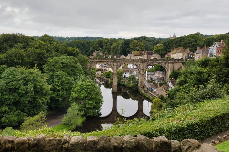 Historic Stone Bridge Over River with Scenic Background Stock Photo ...