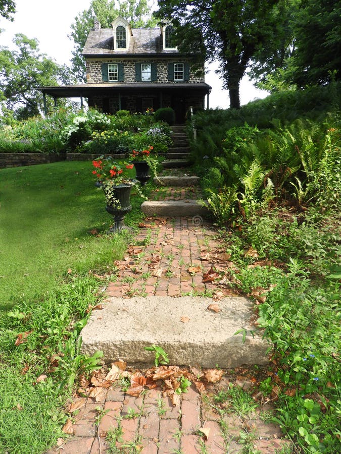 Historic Colonial Stone House Entry Sidewalk Steps and Garden USA Stock ...