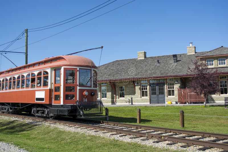 Historic Trolley Transit Train beside Train Station Stock Photo - Image ...