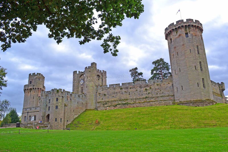 Historic Warwick Castle in Warwickshire Stock Photo - Image of leaves ...