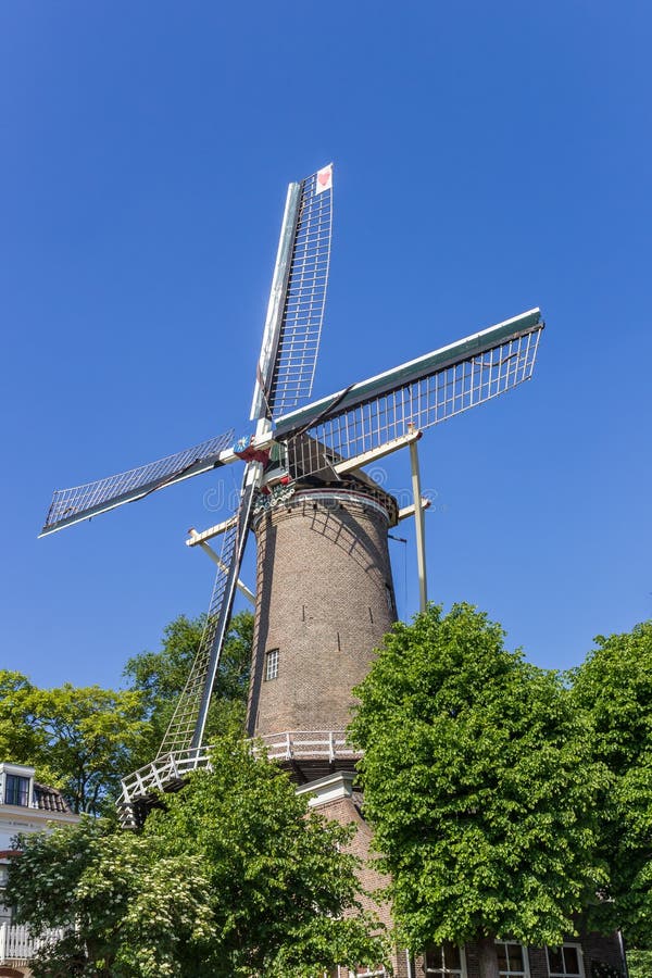 Windmill in Gouda, Holland stock photo. Image of scenic - 34755396