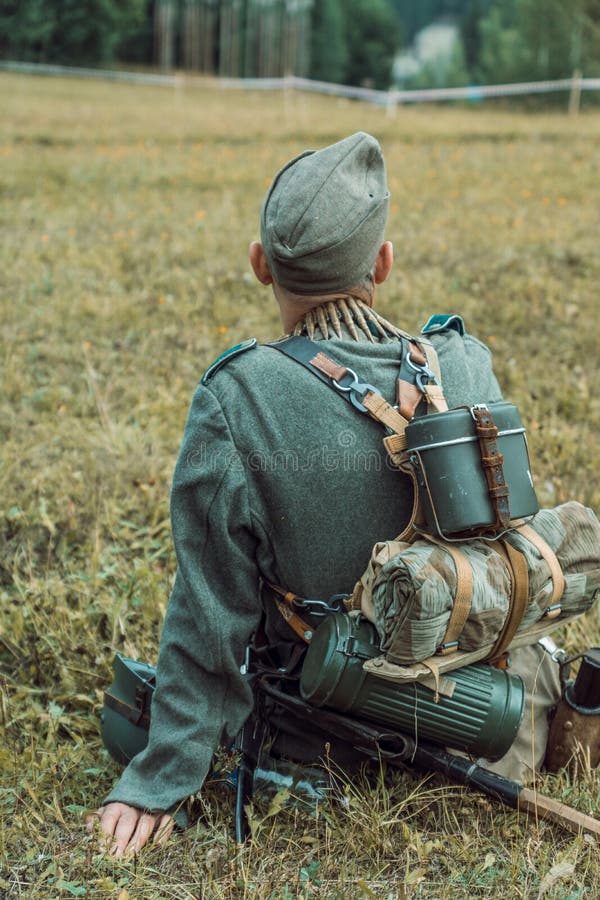 Historical Reconstruction Second World War. a German Soldier Sit ...