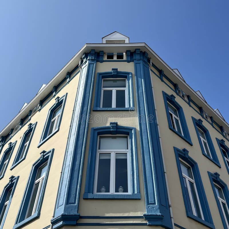 Historiic Building with Blue Window Frames and Other Blue Details in ...