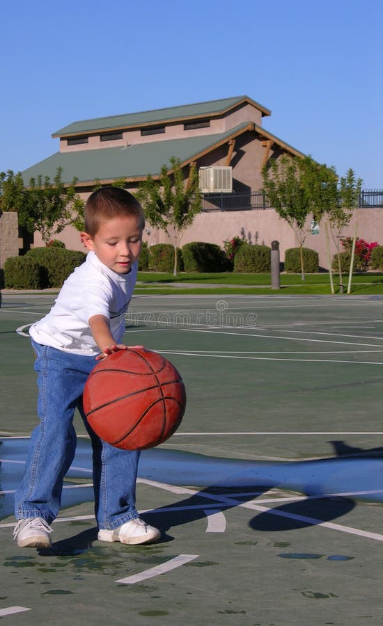 Little Boy Playing Basketball Stock Photo - Image of leisure ...