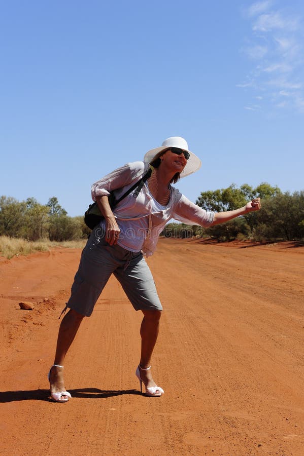 Hitchhiking Woman in Outback Stock Image - Image of female, clear: 21694139