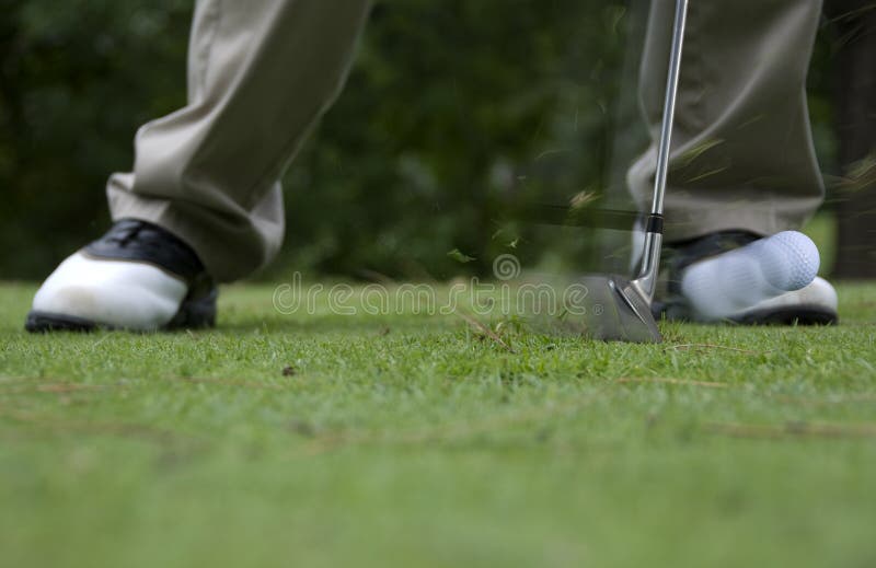 Hitting the bal stock photo. Image of golf, grass, stroke - 98170