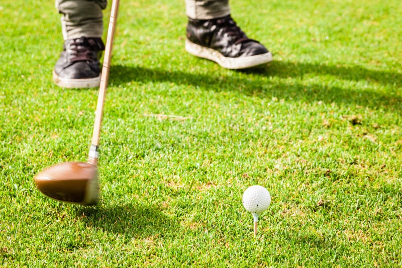 Hitting a Golf Ball with a Putter Club Stock Image - Image of outdoors ...