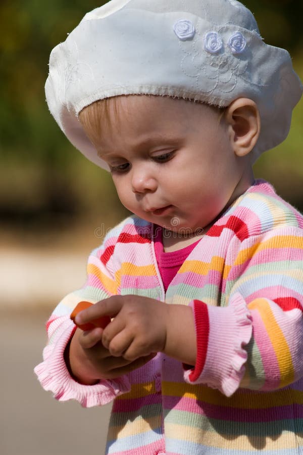 Hmm, what is it? stock image. Image of blonde, beautiful - 3170061