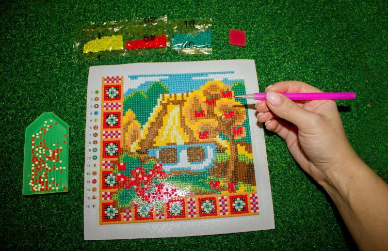 Hobbies - Laying Out Diamond Mosaics. Large Photo of the Process Stock ...