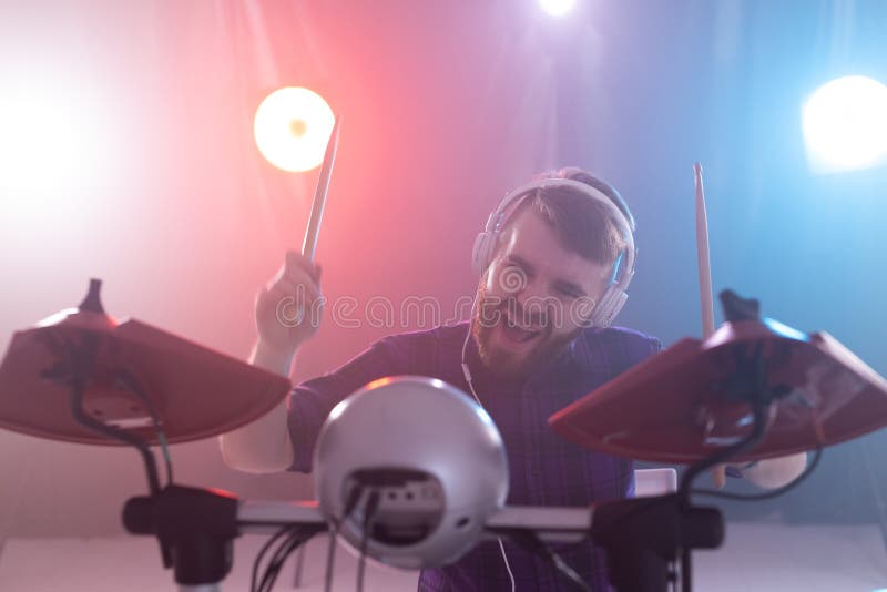 Hobby, Music and People Concept - Drummer with Drum Sticks Making Music ...