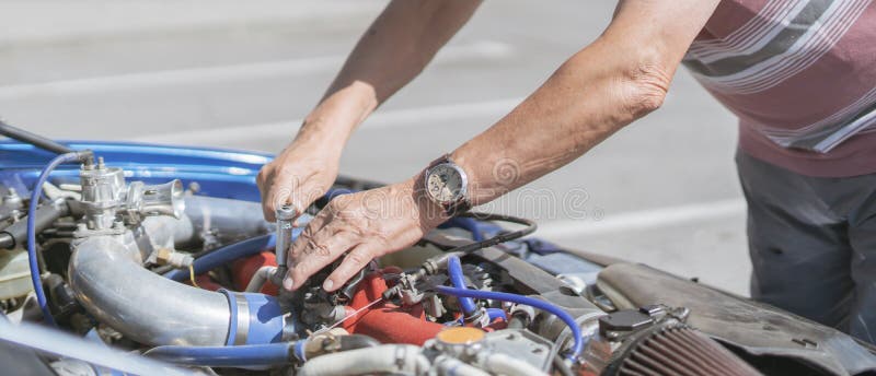 A Hobby of the Senior Man, Old Person Fixing the Car Engine Outdoors ...
