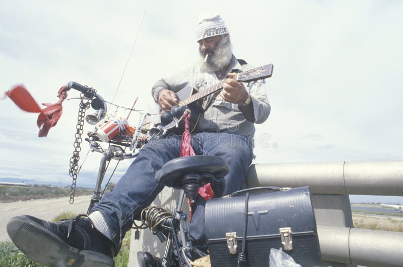 Hobo playing guitar editorial stock image. Image of transient - 26272419