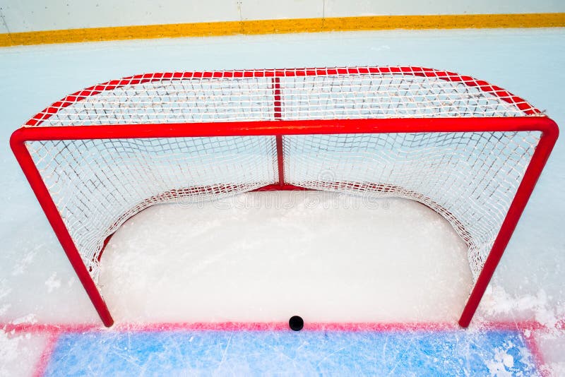 Hockey Goal with Puck on Red Line Stock Photo - Image of goal, line ...