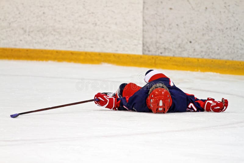 Hockey Player Lying on Ice Rink Editorial Photo - Image of game ...