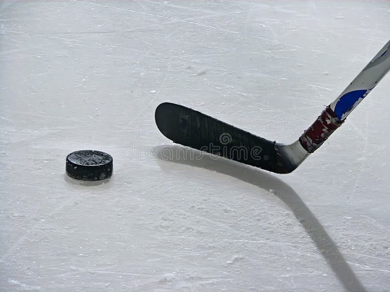 Hockey Puck on the Ice in the Ice Rink Stock Photo - Image of puck ...