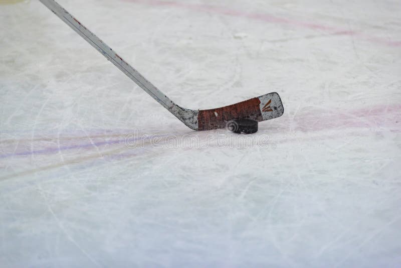 Hockey puck and stick stock image. Image of competition - 82930891