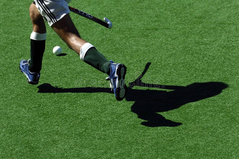 Hockey shadow 2 stock photo. Image of sport, legs, hockey - 1716100